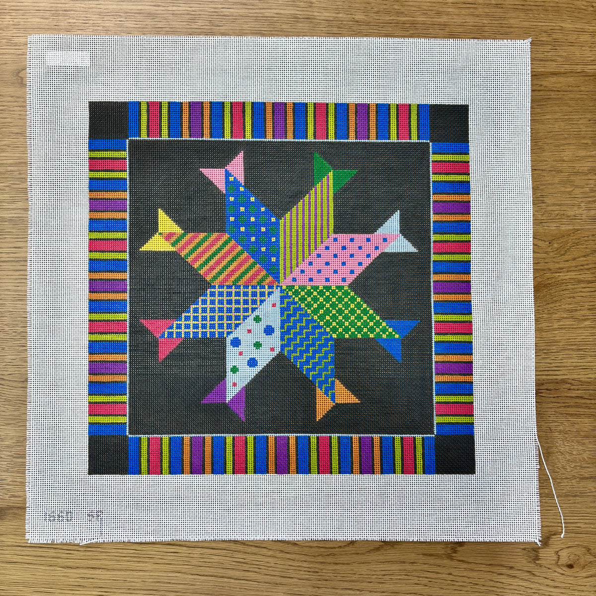 Pinwheel Fish, 14" Quilt - 13 mesh – Susan Roberts Needlepoint